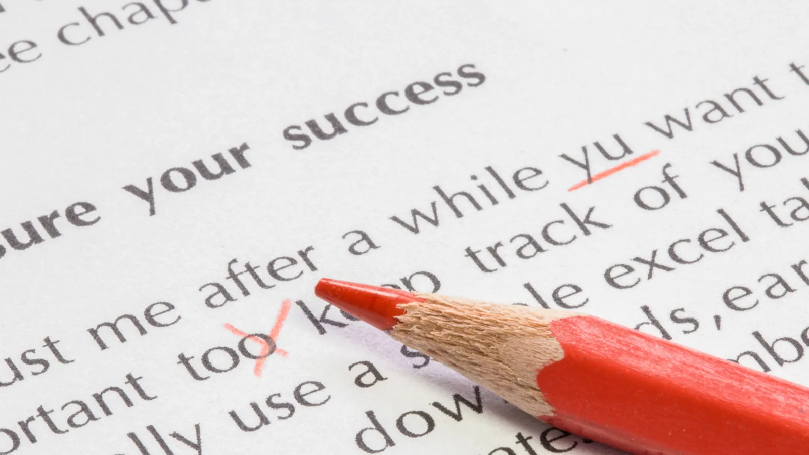 red pencil proofreading concept - NashvilleGab